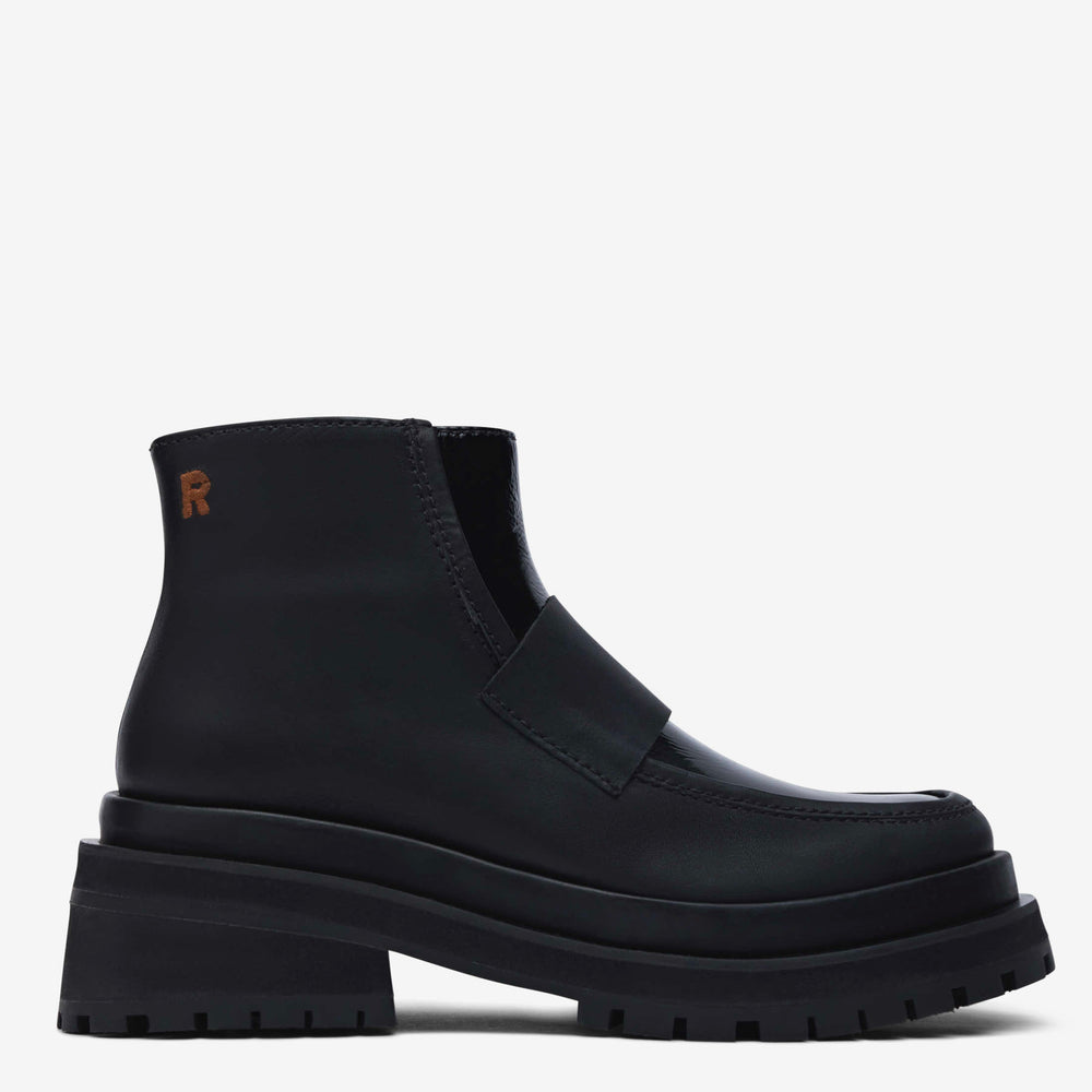 Rotunda – Limited Edition Boots, Coats, and Handbags