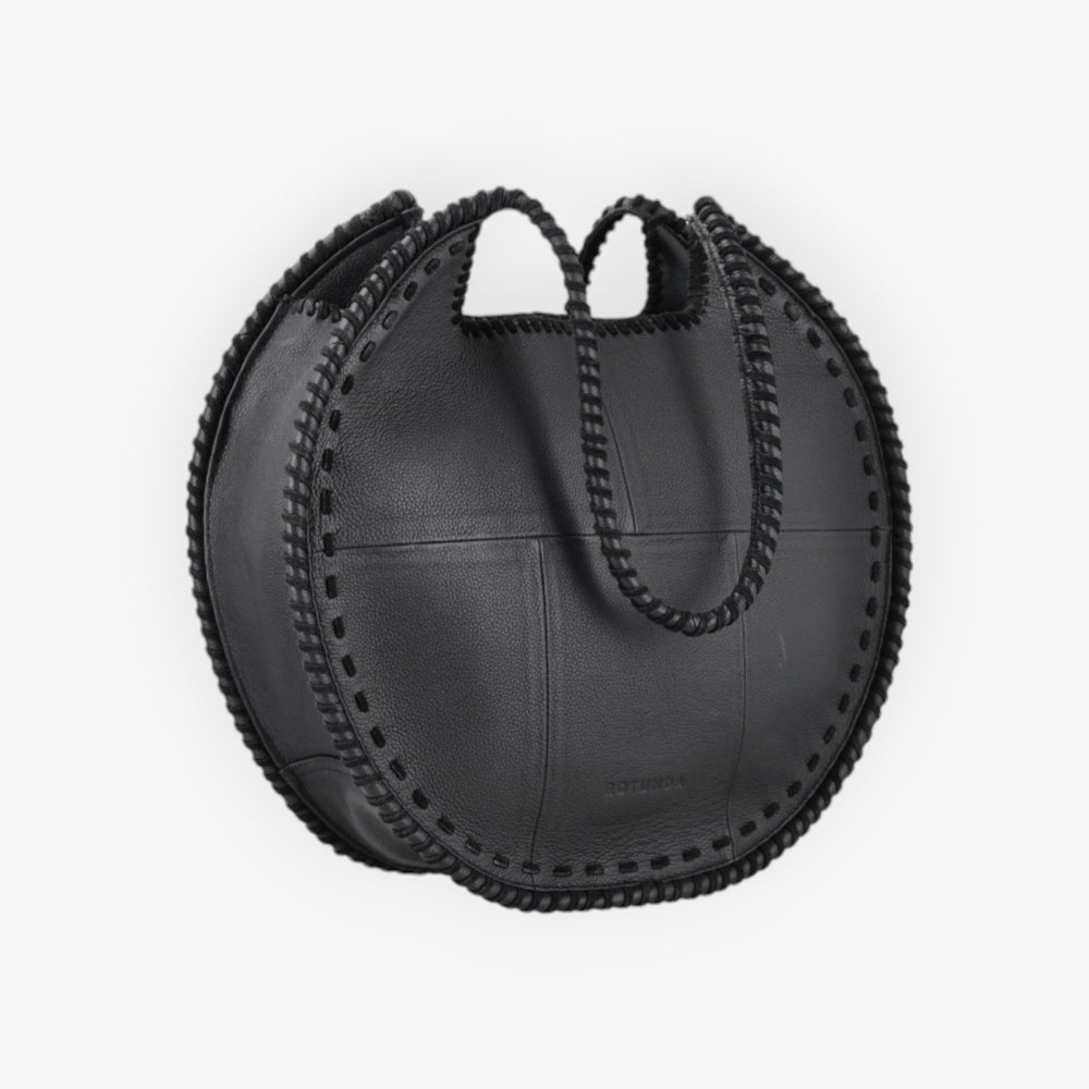 Rotunda – Limited Edition Boots, Coats, and Handbags