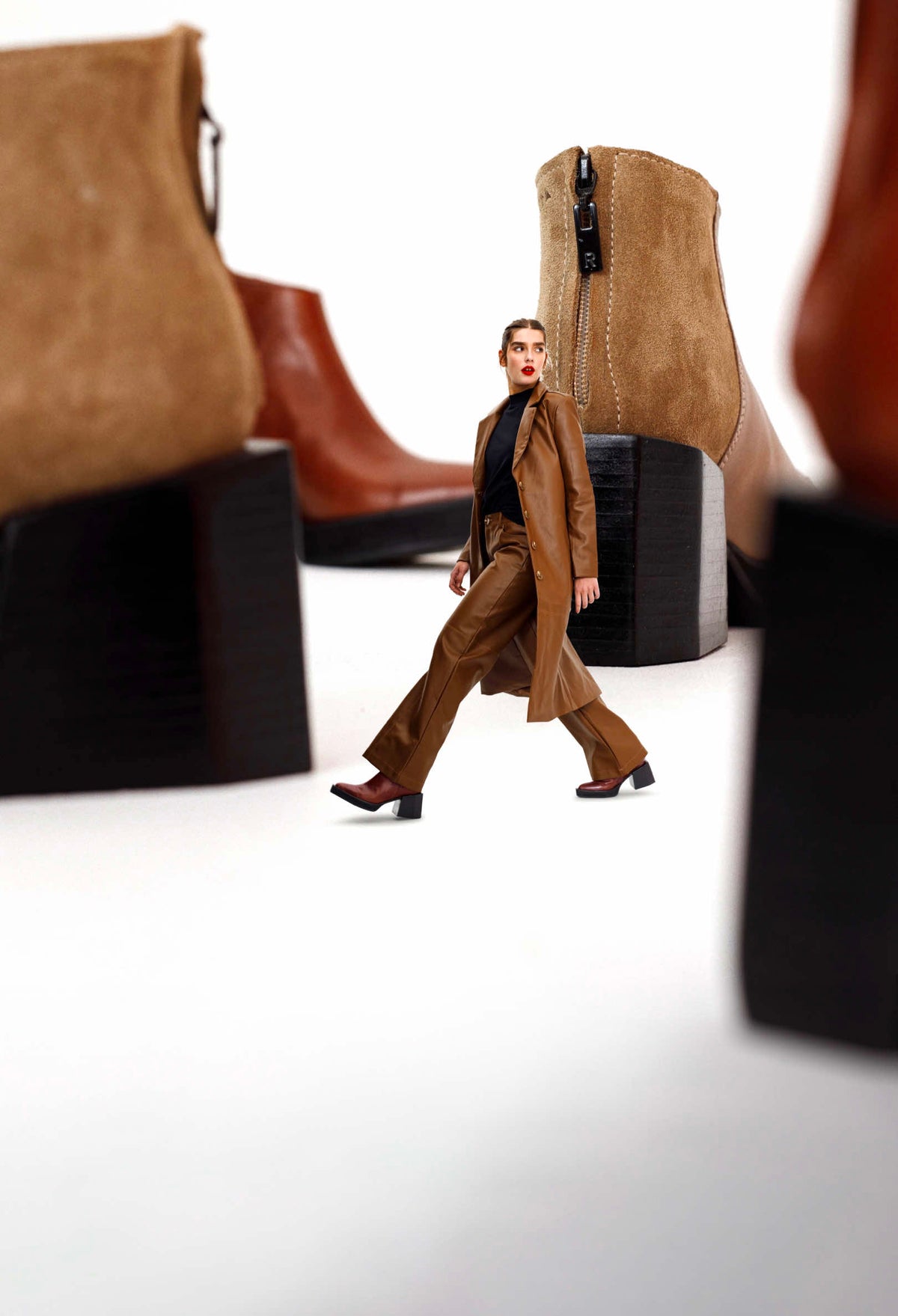 Rotunda – Limited Edition Boots, Coats, and Handbags