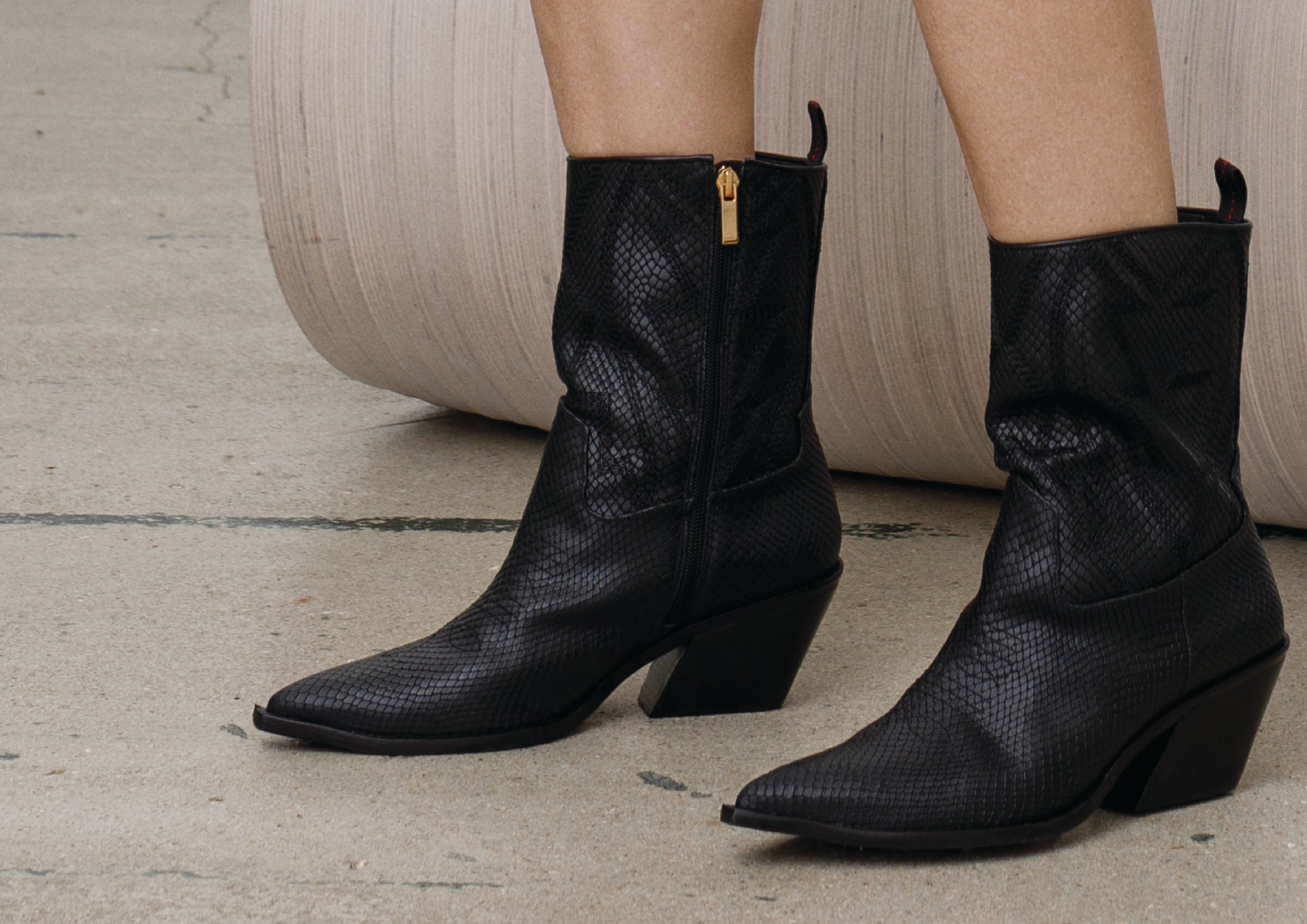 Rotunda – Limited Edition Boots, Coats, and Handbags