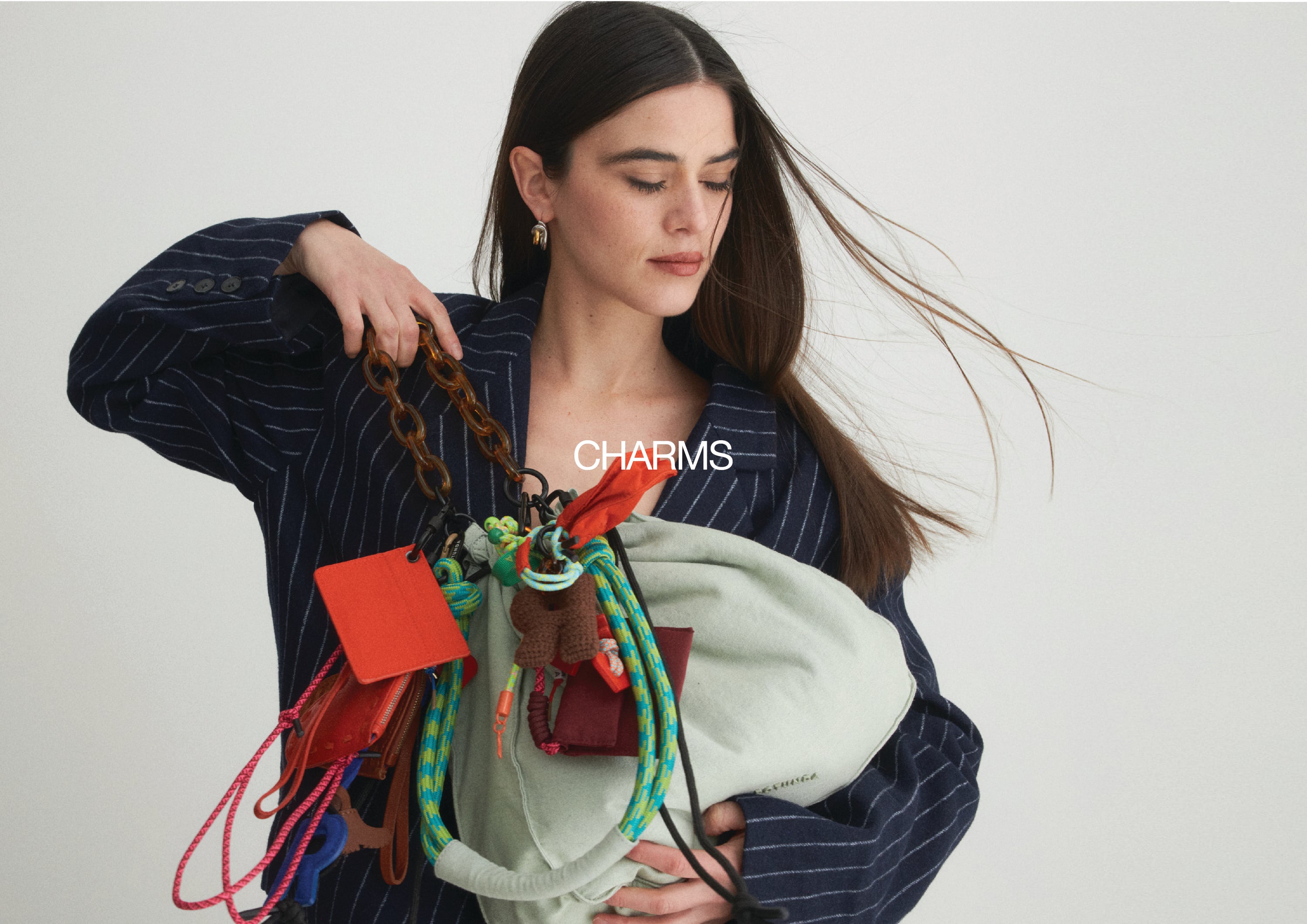 Rotunda – Limited Edition Boots, Coats, and Handbags